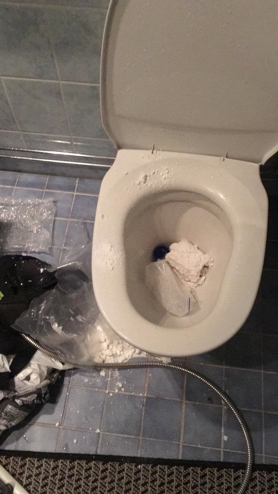 Smugglers threw drugs down the toilet when police arrived